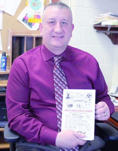 John Rocchi contributes to textbook | News, Sports, Jobs - The Herald Star